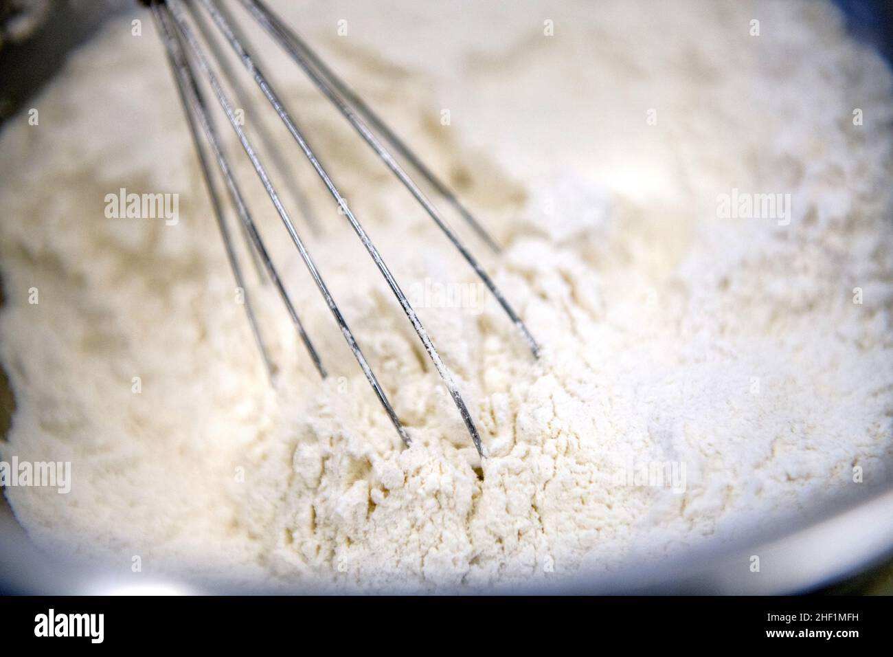 Wisk and bowl cooking Stock Photo - Alamy