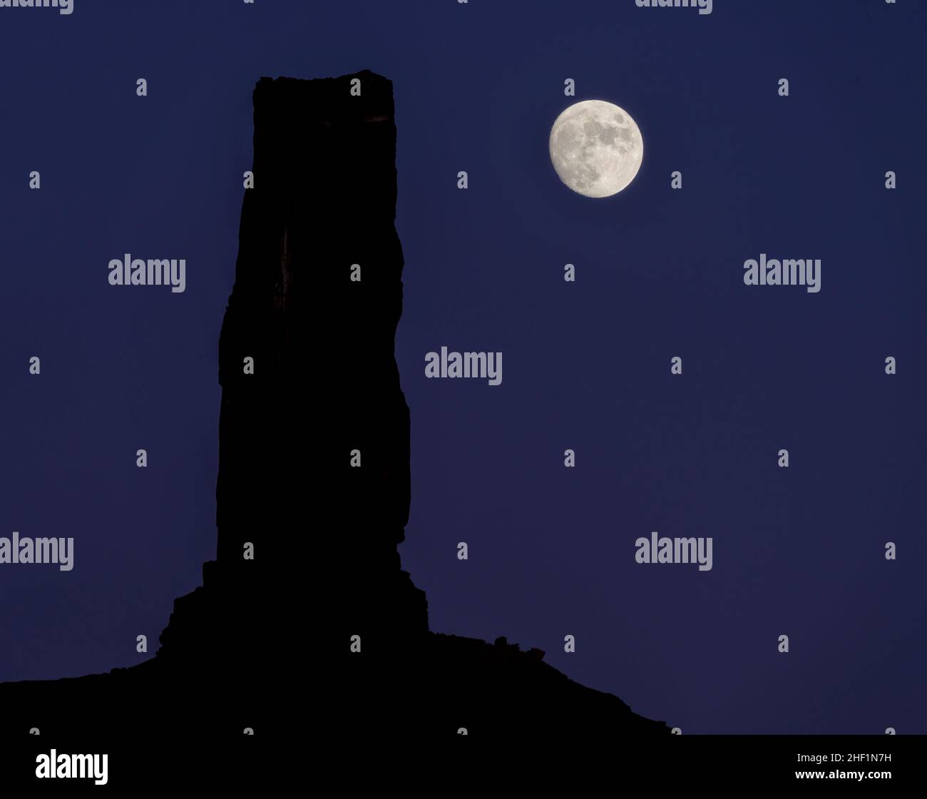 The moon rising behind Castleton Tower in Utah Stock Photo - Alamy
