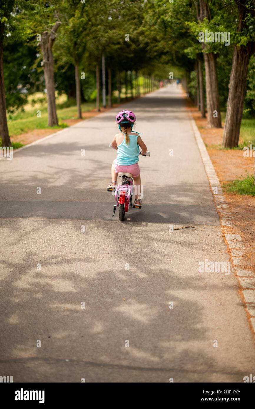 child riding a bike Stock Photo - Alamy