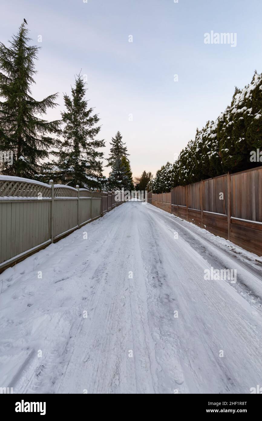 Alley with Snow in a residential neighborhood in the city suburbs Stock ...