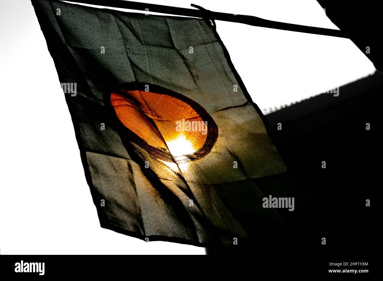 The national flag of Bangladesh is flying in the sky. The flag of ...