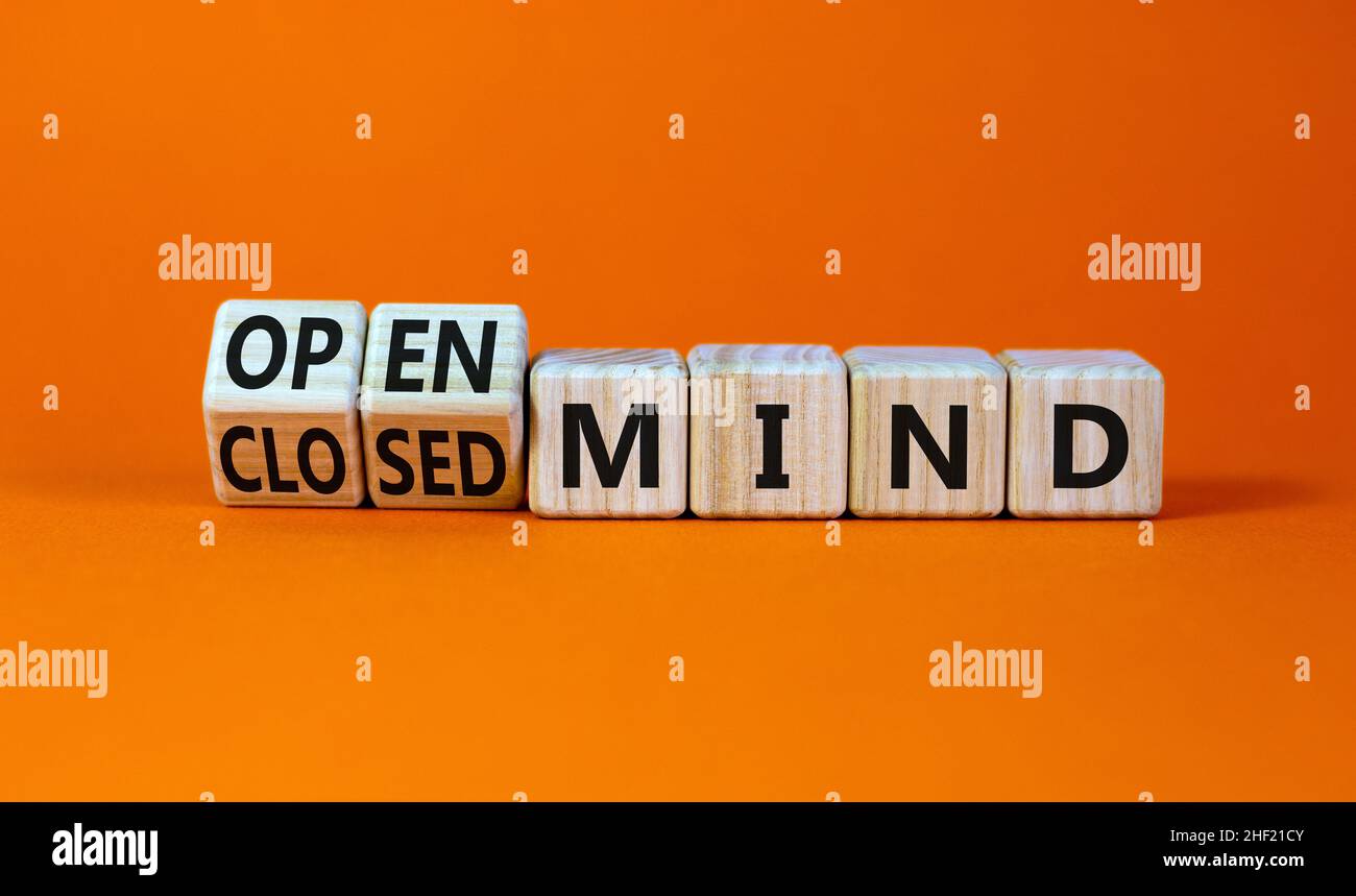 Open or closed mind symbol. Turned wooden cubes and changed concept ...
