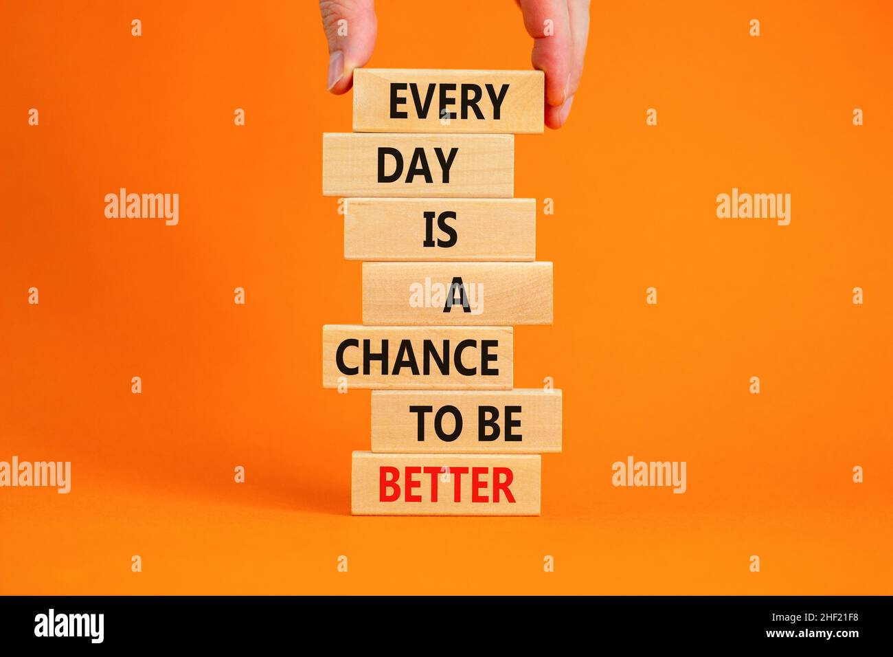 Chance to be better symbol. Wooden blocks with words Every day is a ...