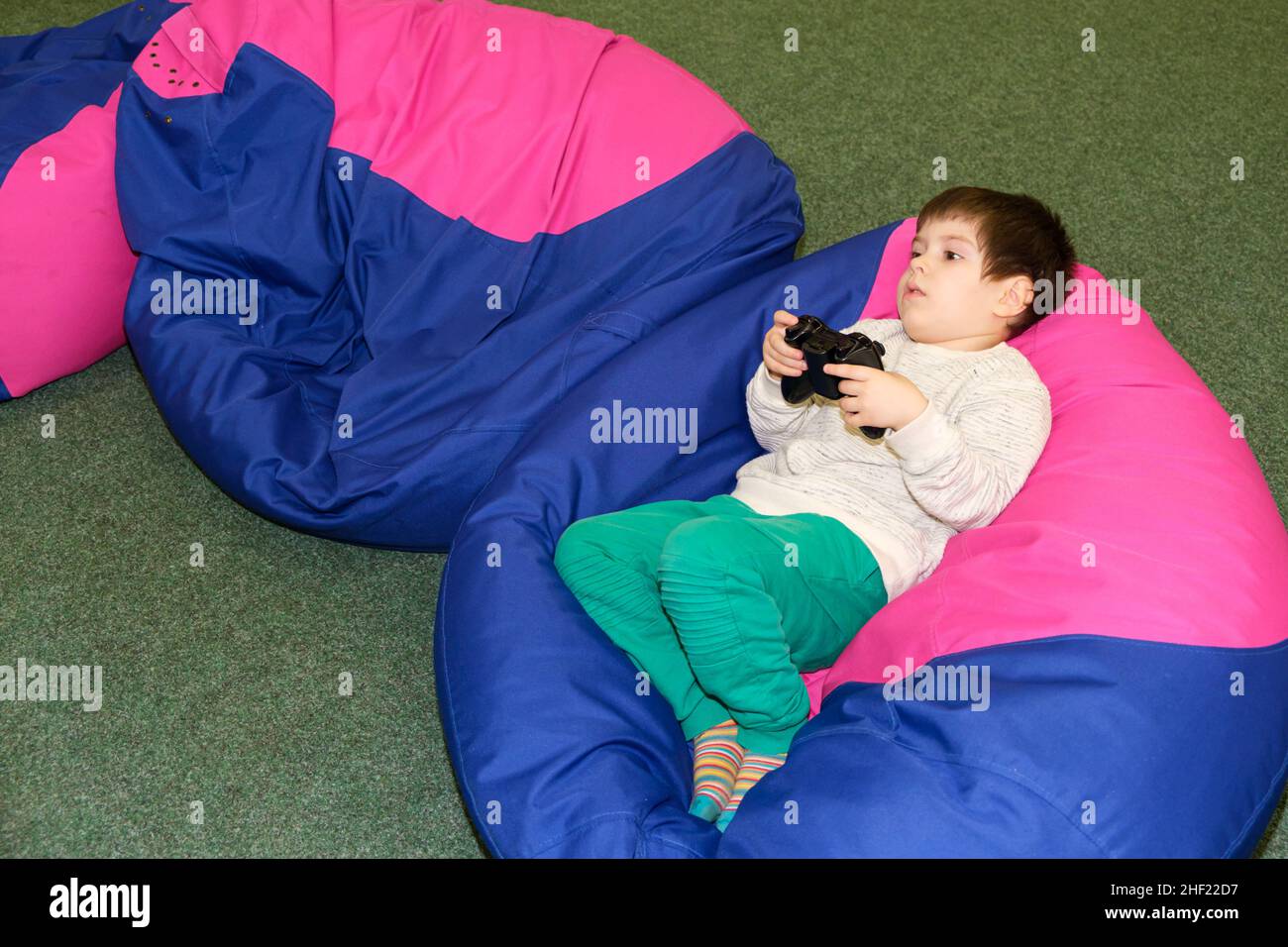 Preschooler boy lies in hi-res stock photography and images - Alamy