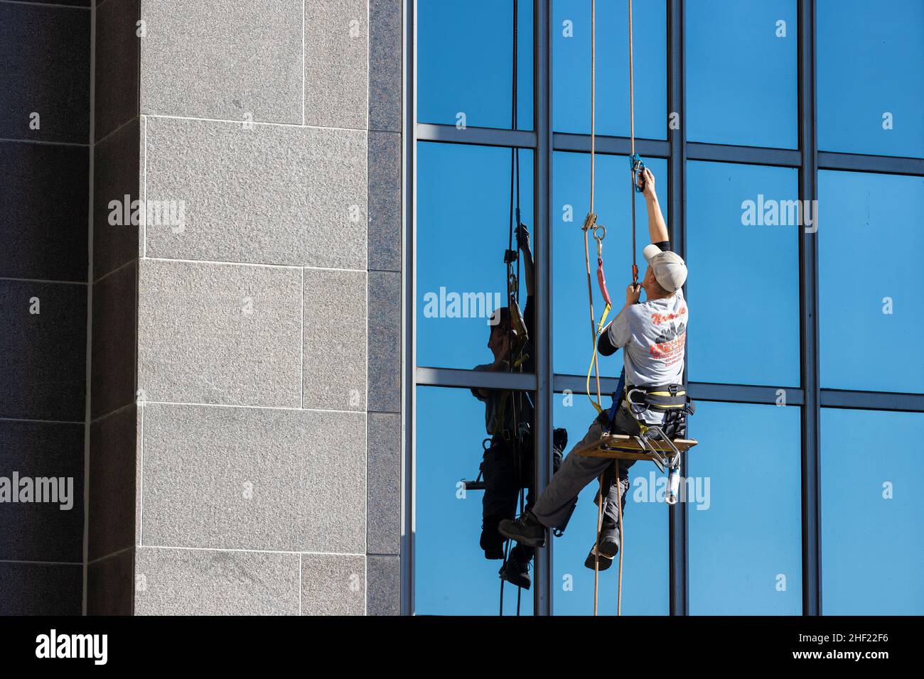 Nashville, Tennessee, USA - November 7, 2021: A window washer works on ...