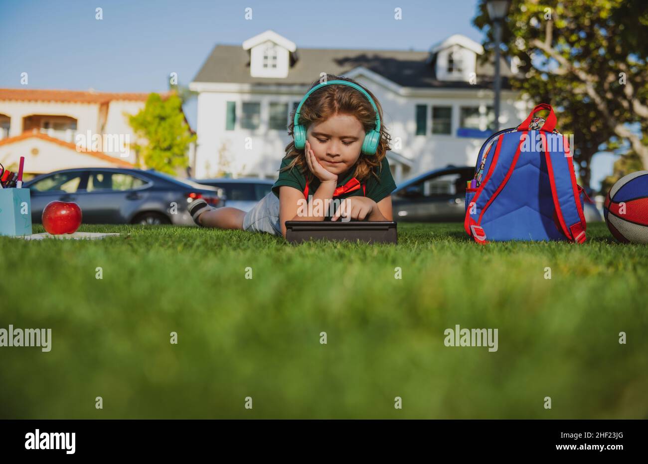 Kid outdoor education. Child doing homework outdoor. Nerd pupil Stock ...