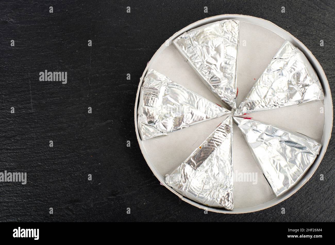 Cheesy triangles hi-res stock photography and images - Alamy