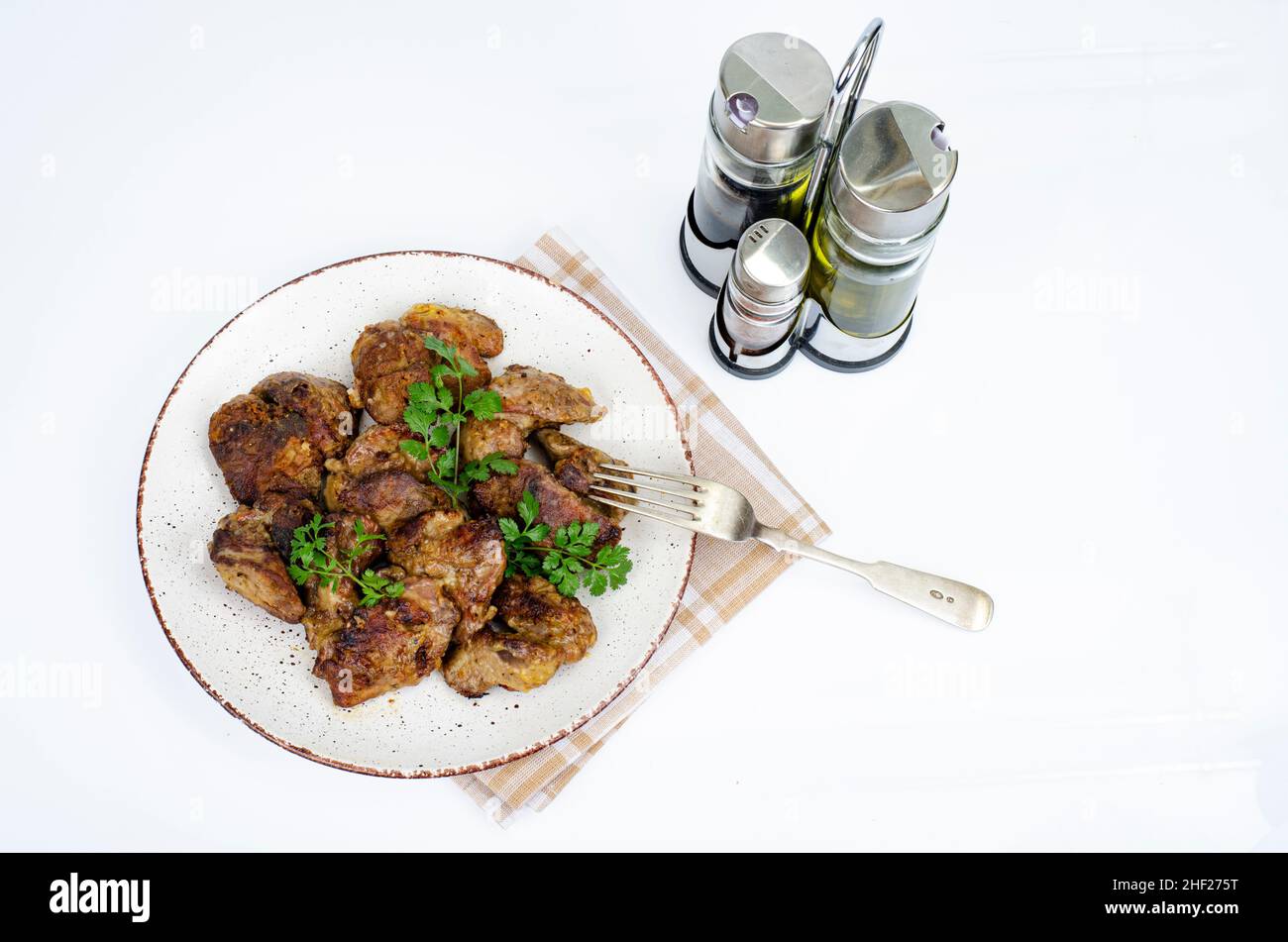 Cooked chicken liver on plate. Liver dishes. Photo Stock Photo - Alamy