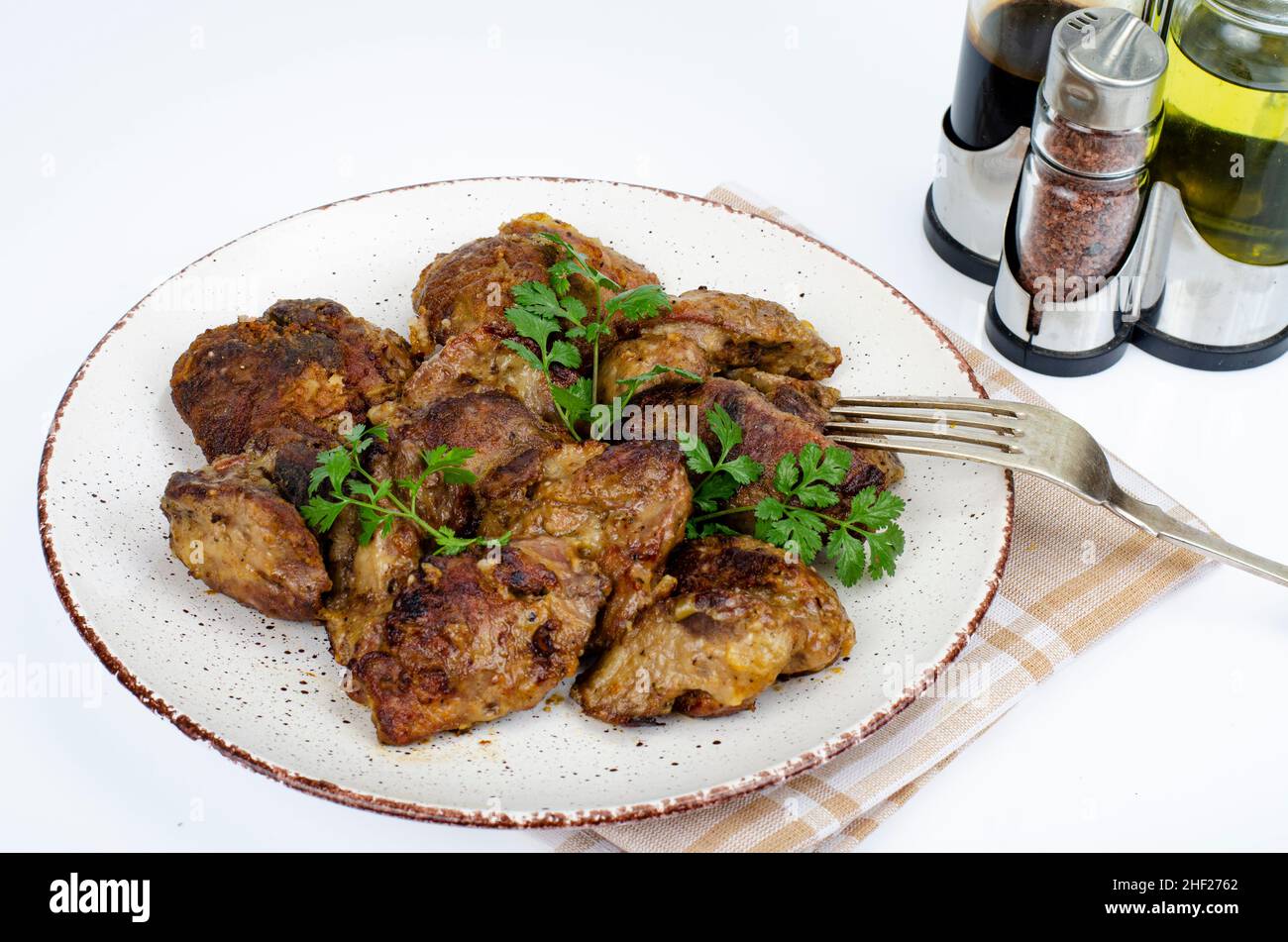 Cooked chicken liver on plate. Liver dishes. Photo Stock Photo - Alamy
