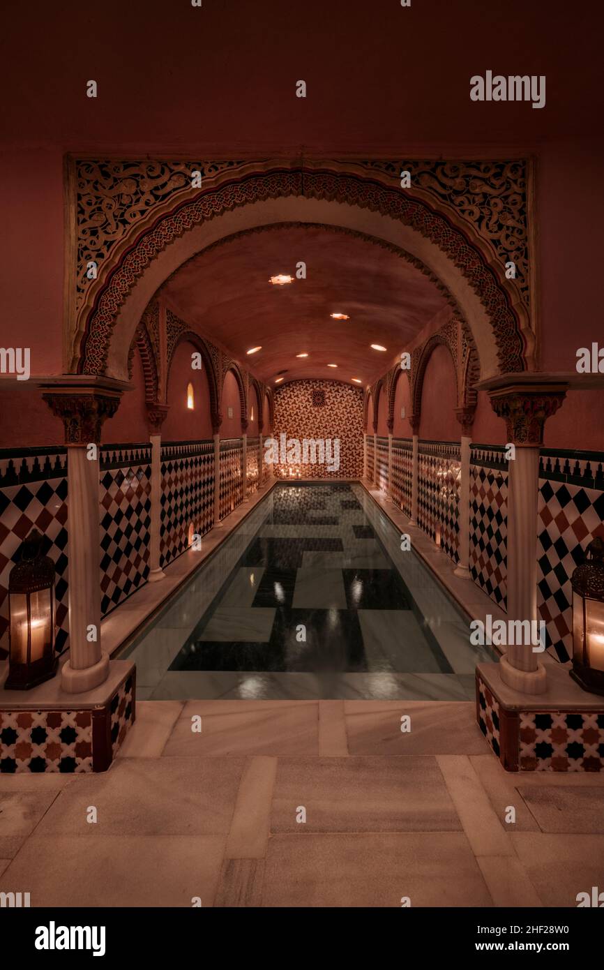 Thermal water pool with marble colonnade and filigree semicircular ...