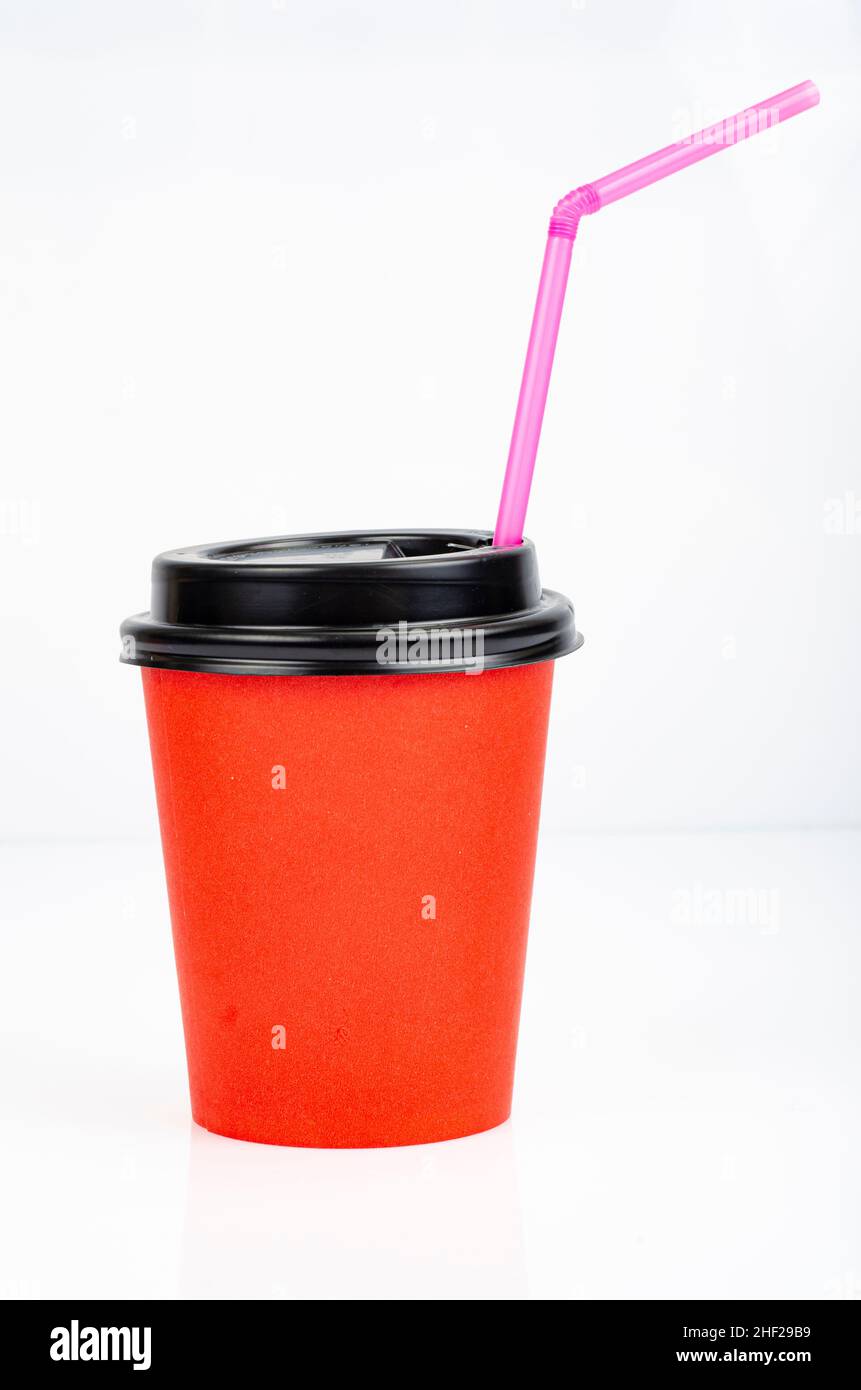 Red eco cardboard glass for drinks. Studio Photo Stock Photo - Alamy