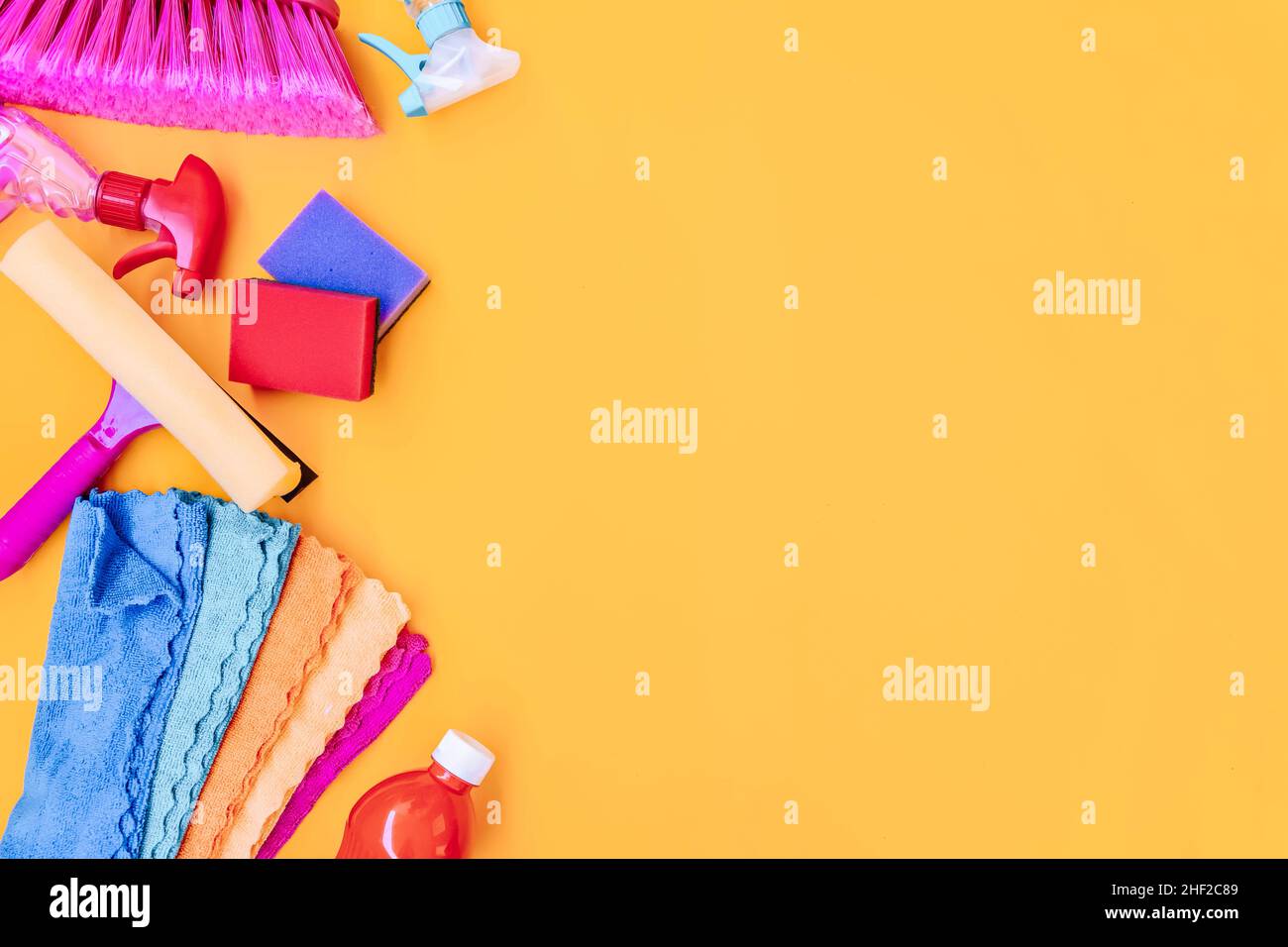 cleaning supplies tools on plain background Stock Photo - Alamy