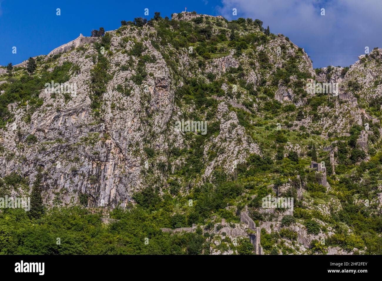 Town walls on the rocks above Kotor, Montenegro Stock Photo - Alamy