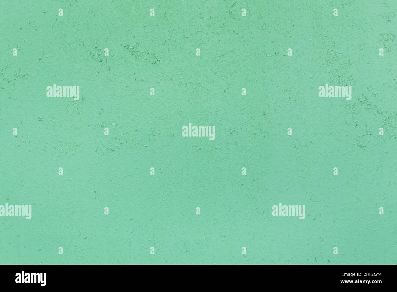 Light green paint on old metallic weathered iron texture rough ...