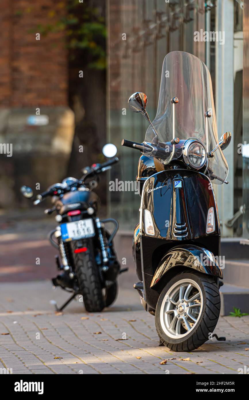 Typical italian street scene vespa hi-res stock photography and images ...