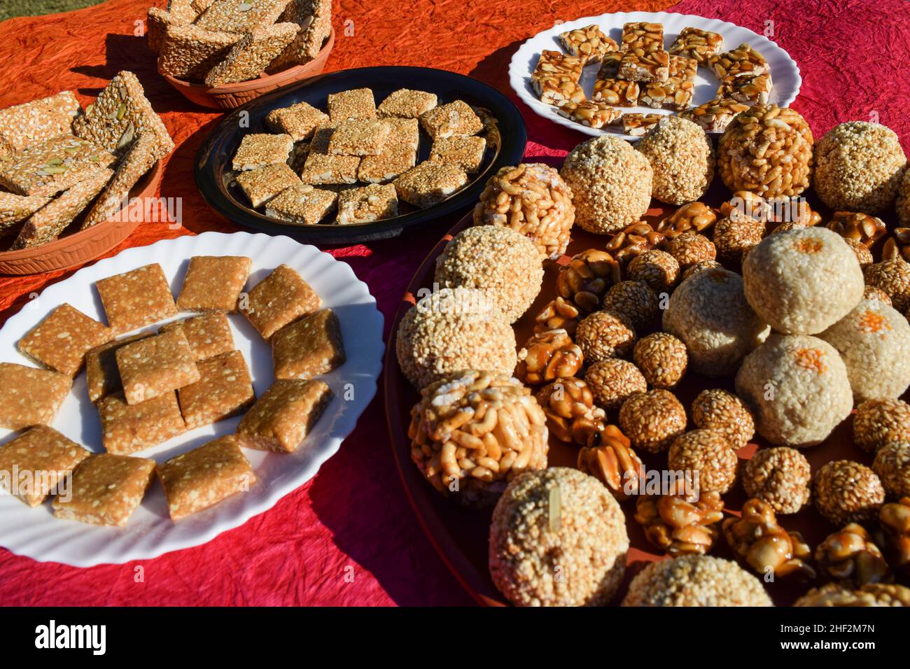Tasty Assorted sankranti sweets. Til laddu, peanut, amaranth, sesame ...