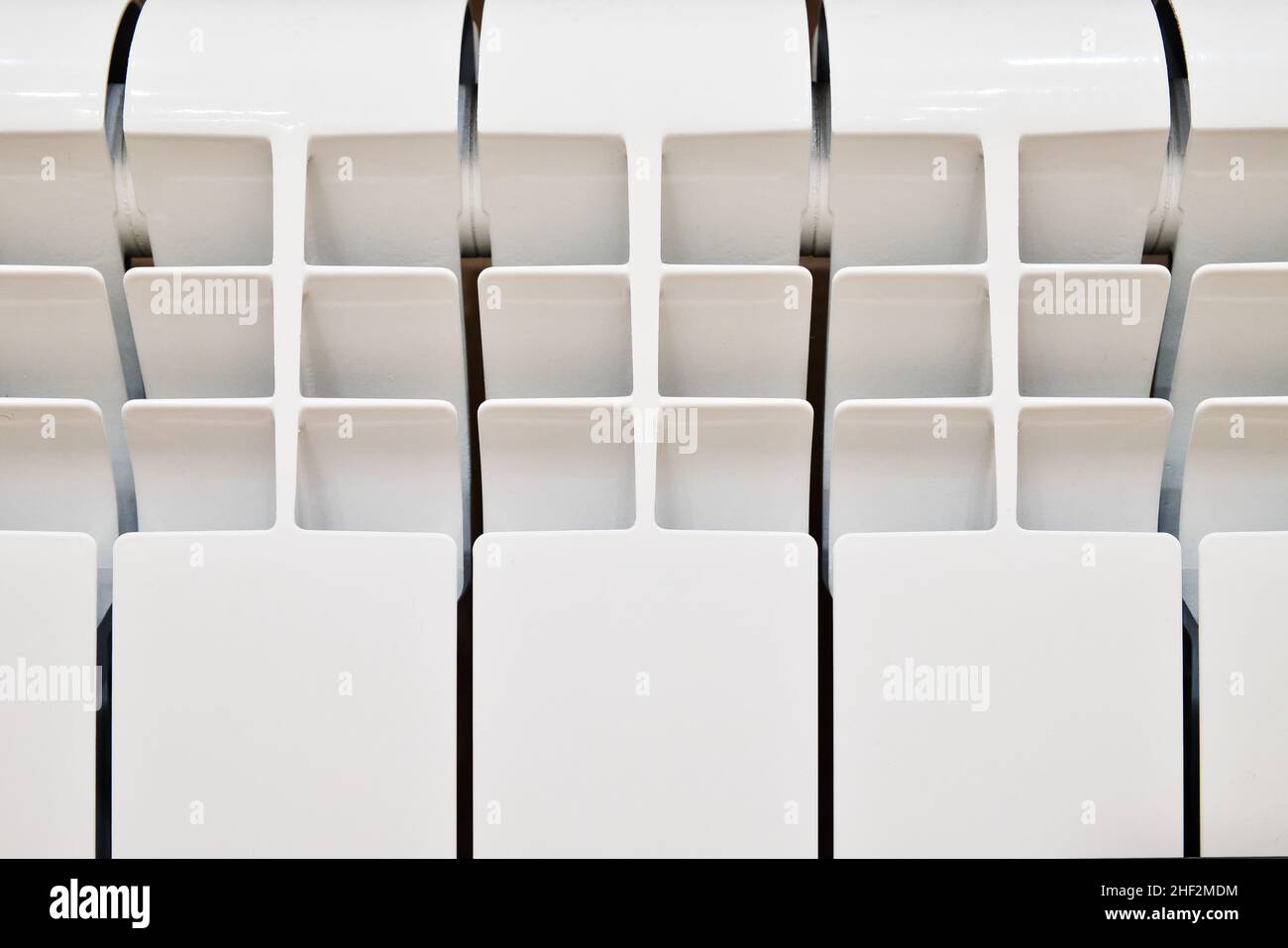 Close-up of modern home heating radiator. Bimetal, aluminium radiator ...