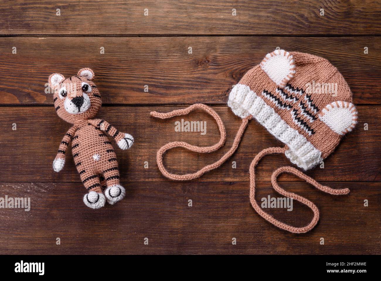Beautiful knitted tiger from threads. Toy made with your own hands in ...