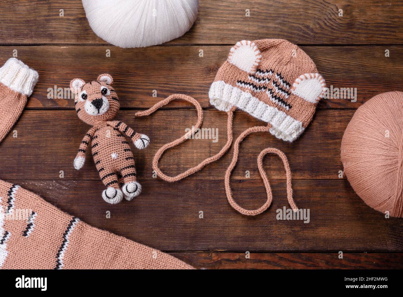 Beautiful knitted tiger from threads. Toy made with your own hands in ...
