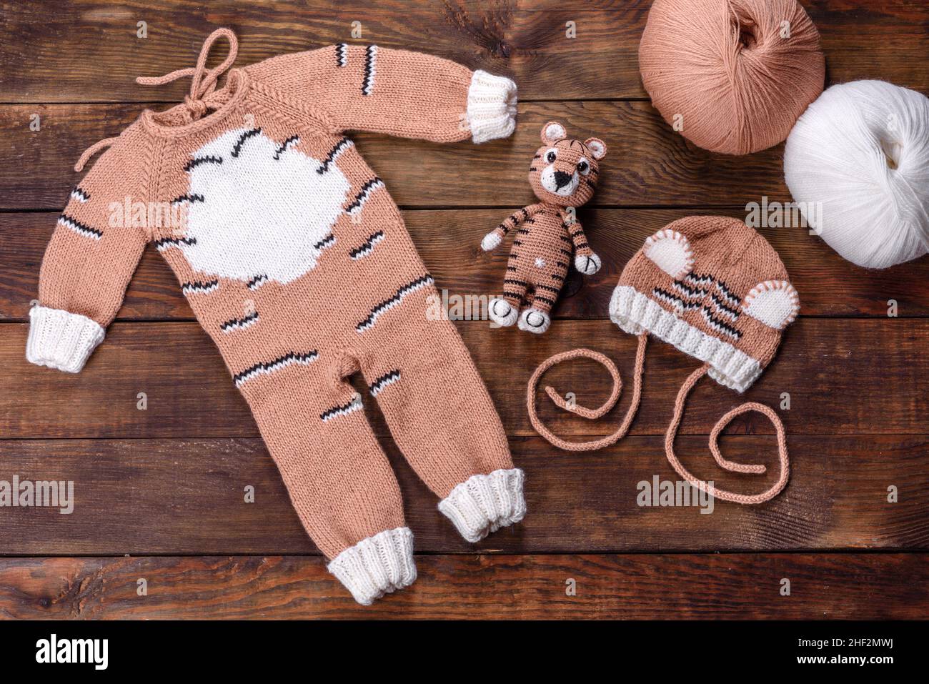 Beautiful knitted tiger from threads. Toy made with your own hands in ...