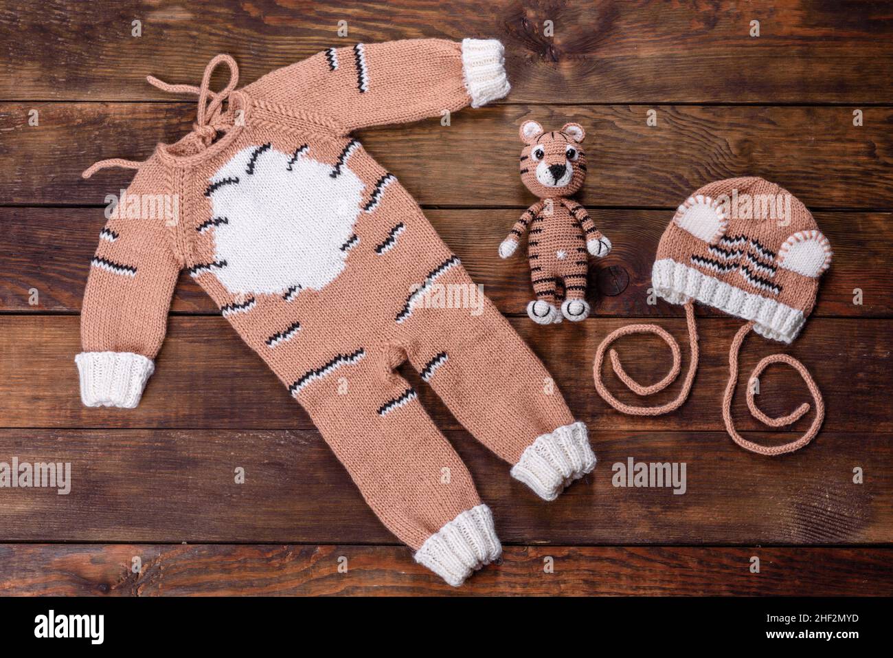 Beautiful knitted tiger from threads. Toy made with your own hands in ...