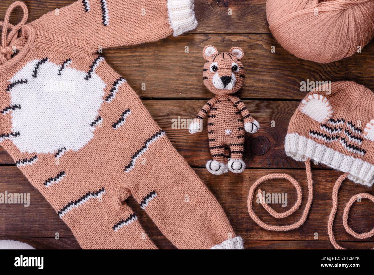 Beautiful knitted tiger from threads. Toy made with your own hands in ...