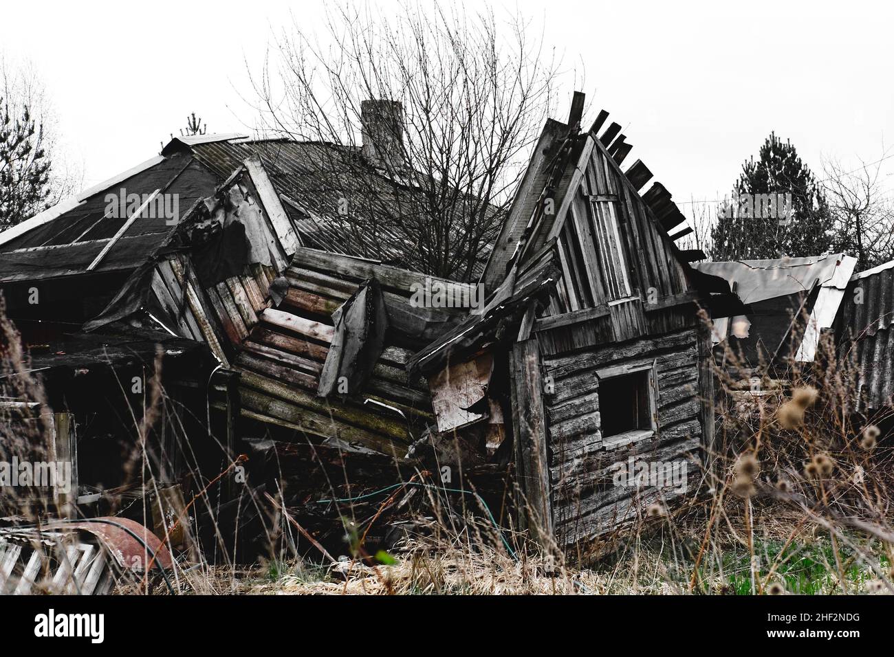 Old destroyed abandoned wooden house. Rustic broken building. Ruins ...
