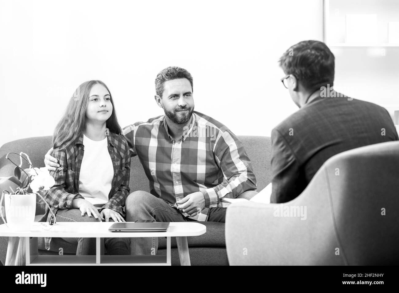 Father and child daughter with girl discussing problems in family with ...