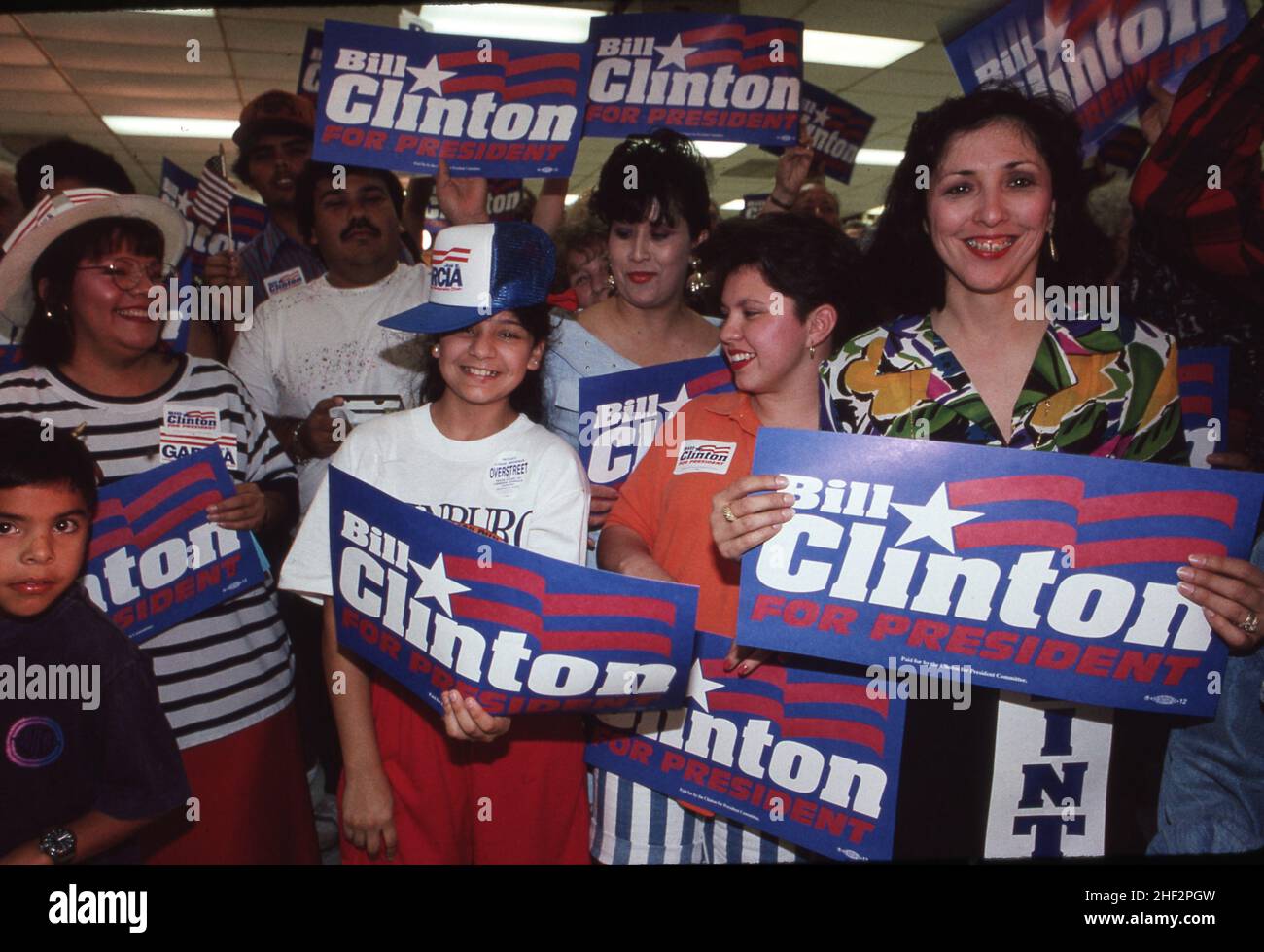 Weslaco, Texas USA 1992: Hispanics holding signs supporting Bill ...