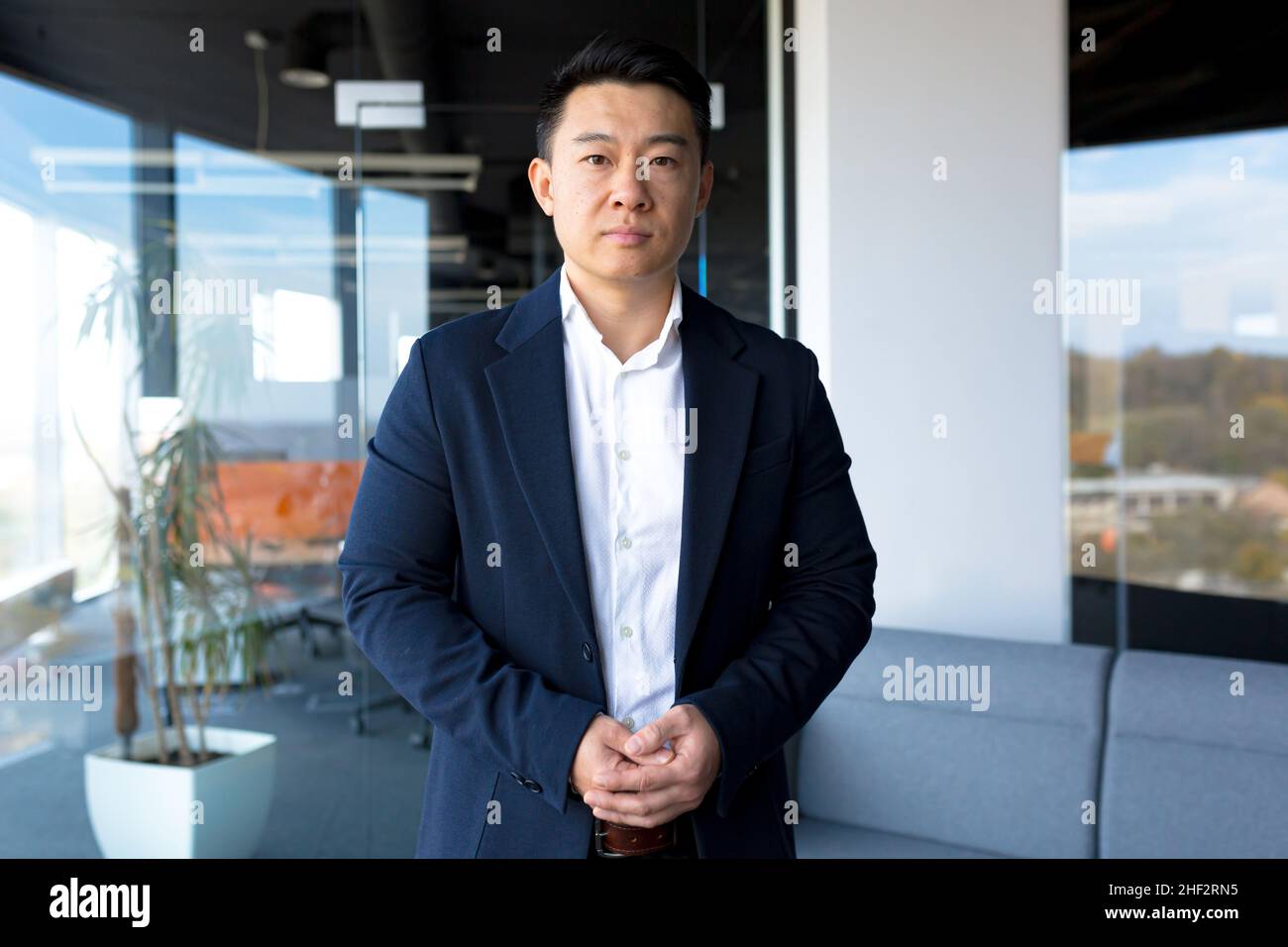 Portrait of successful business man boss Asian serious man looking at ...