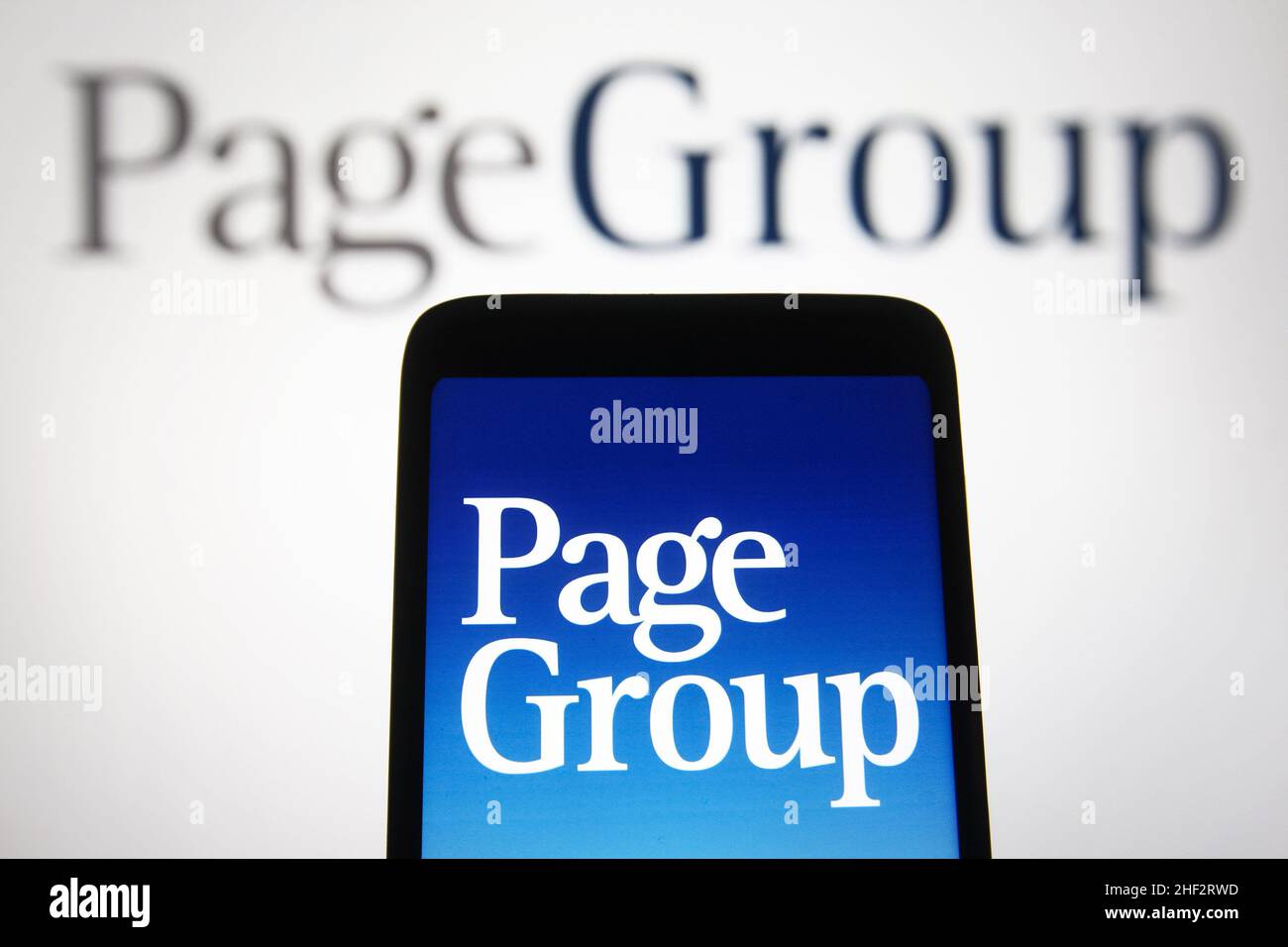 In this photo illustration, a PageGroup Plc logo is seen on a ...