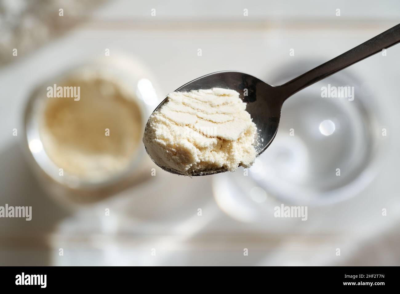 Whey protein powder on a metal spoon - preparation of a healthy fitness ...
