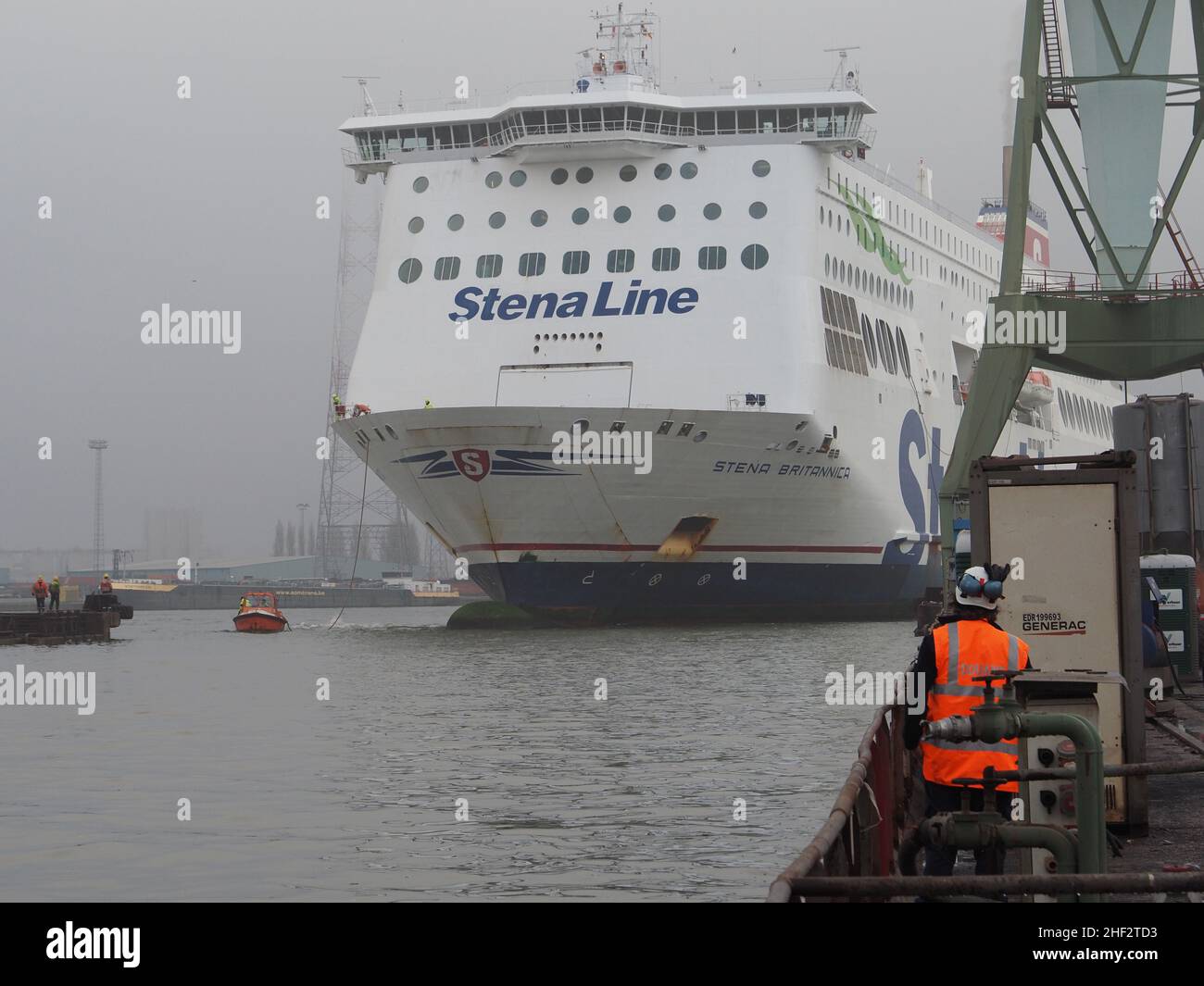 Stena Line ferry Stena Brittanica being manoeuvred into a dry dock in ...