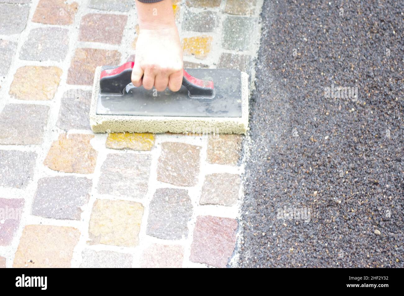 Cobblestone repair hi-res stock photography and images - Alamy