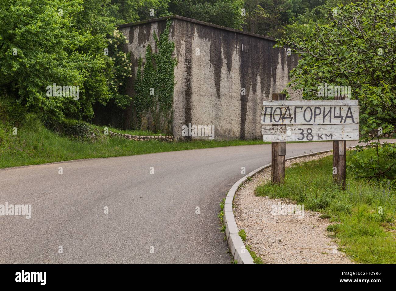 Sign Podgorica 38 km in Montenegro Stock Photo - Alamy