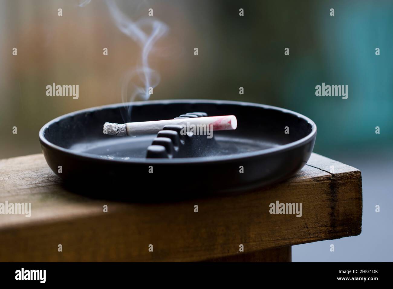 Lipstick on cigarette close up smoking. Female smoking tobacco ...