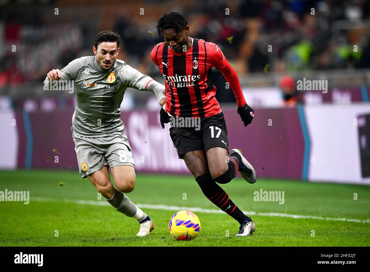 Milan, Italy. 13 January 2022. Rafael Leao of AC Milan is challenged by ...