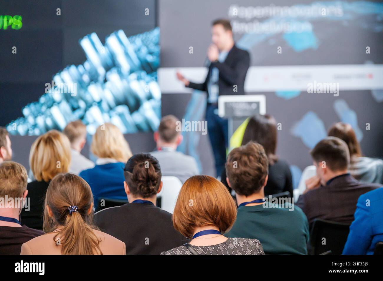 Audience watching presentation during business seminar Stock Photo - Alamy