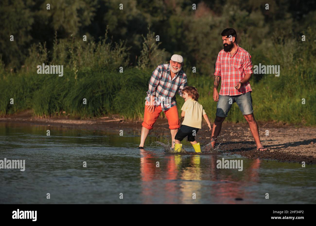 Three generation family. Skipping Stones with Dad adn Granddad. Three ...