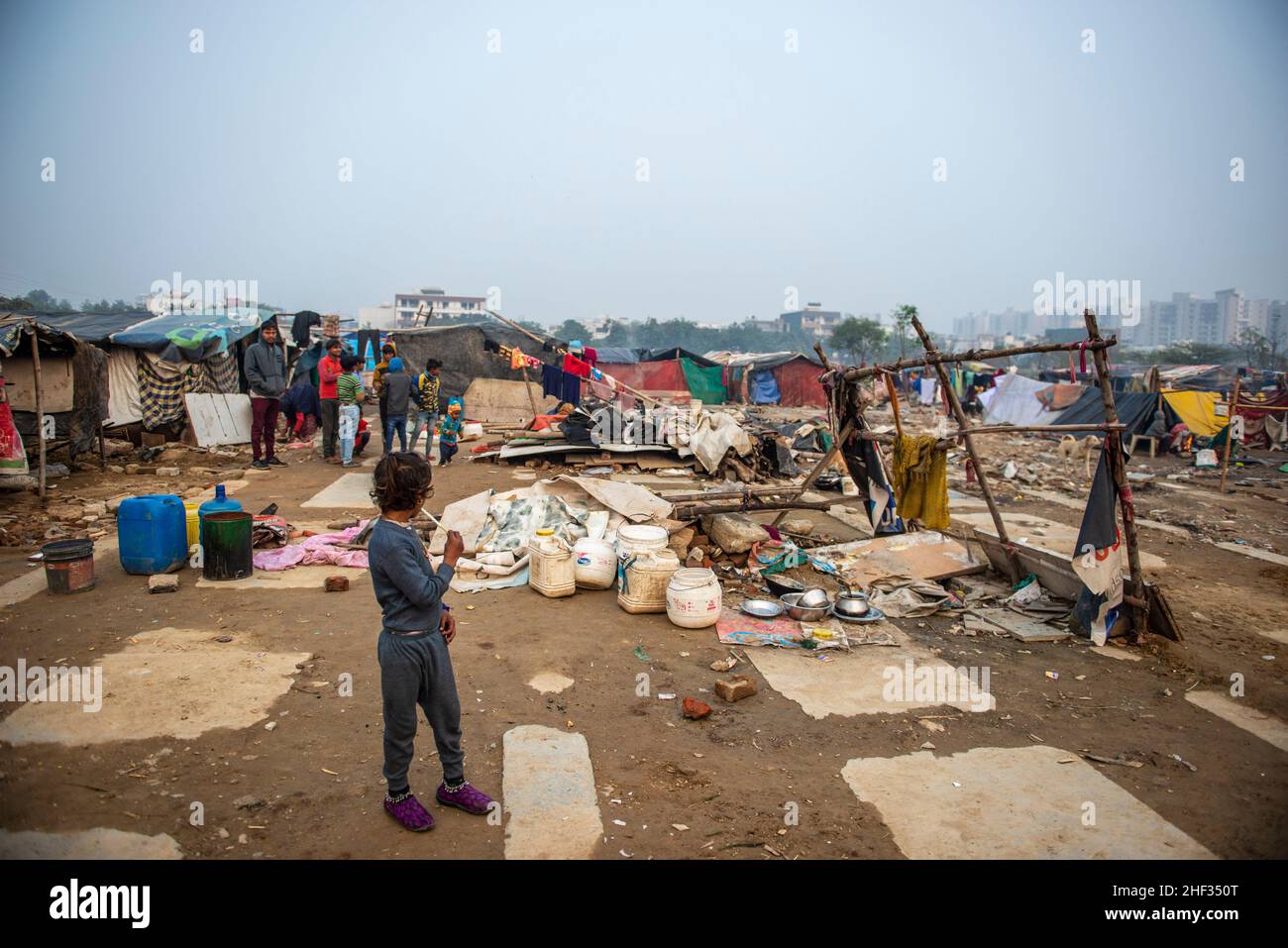 A view of a derelict area inhabited by slum dwellers with their ...