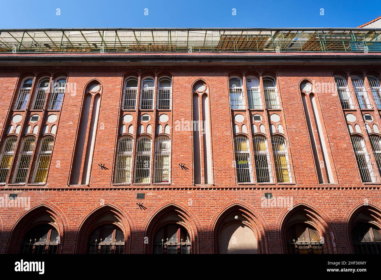facade of a historic brick tenement house in the city of Poznan Stock ...