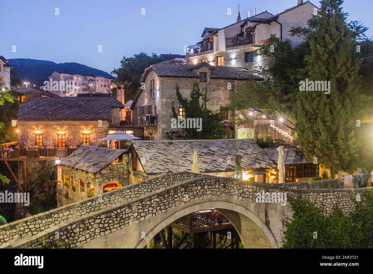 Evening view of Kriva cuprija bridge in Mostar. Bosnia and Herzegovina ...