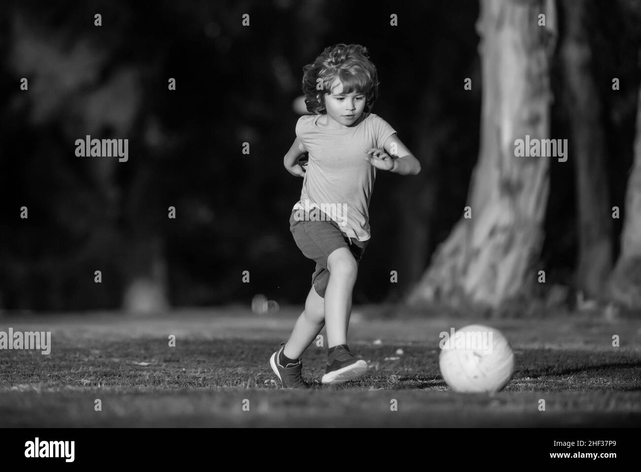 Little Black Kids Playing Football