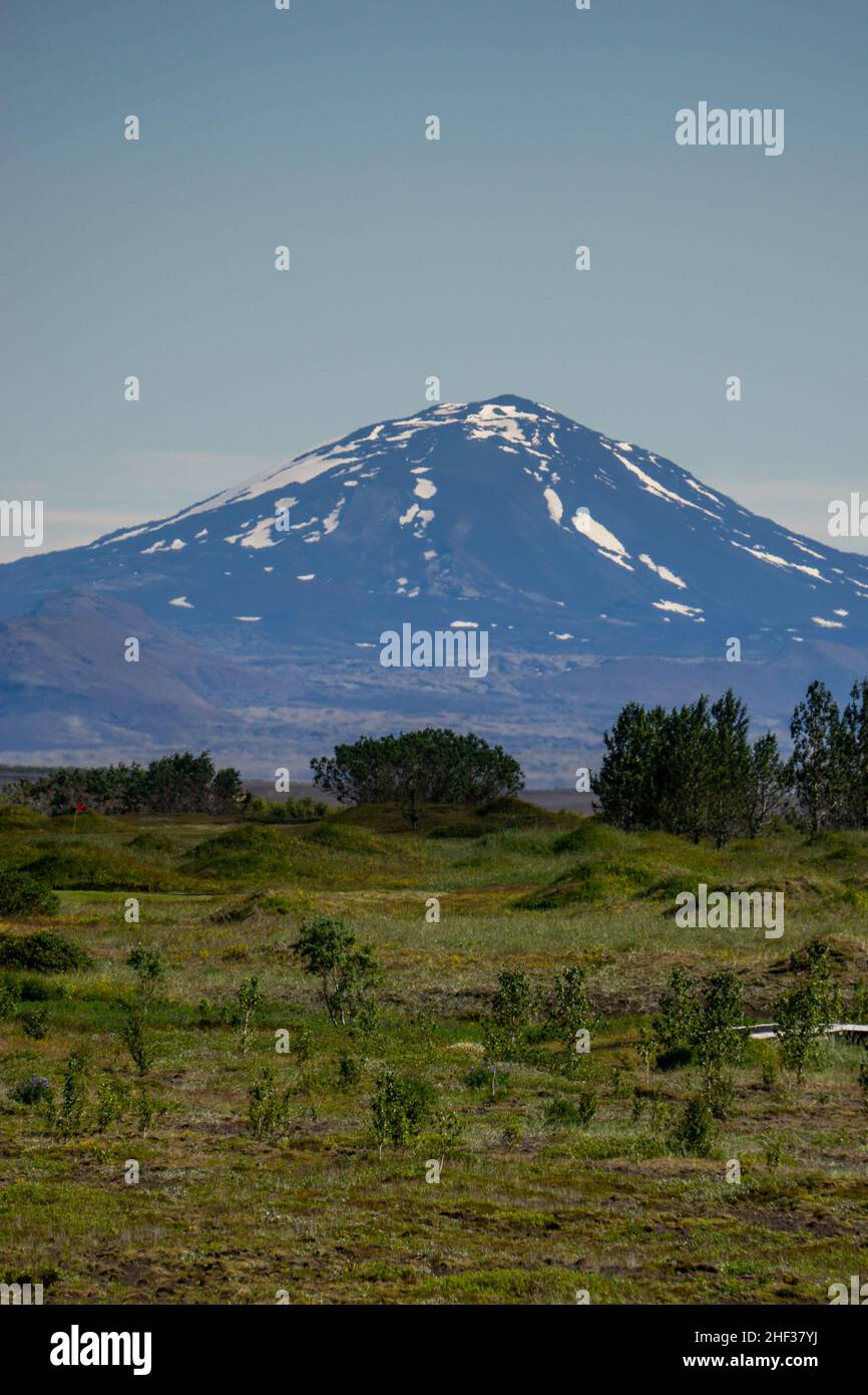 The infamous Hekla volcano towers above the landscape of South Iceland ...