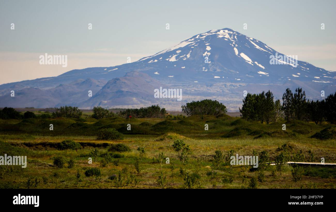 The infamous Hekla volcano towers above the landscape of South Iceland ...