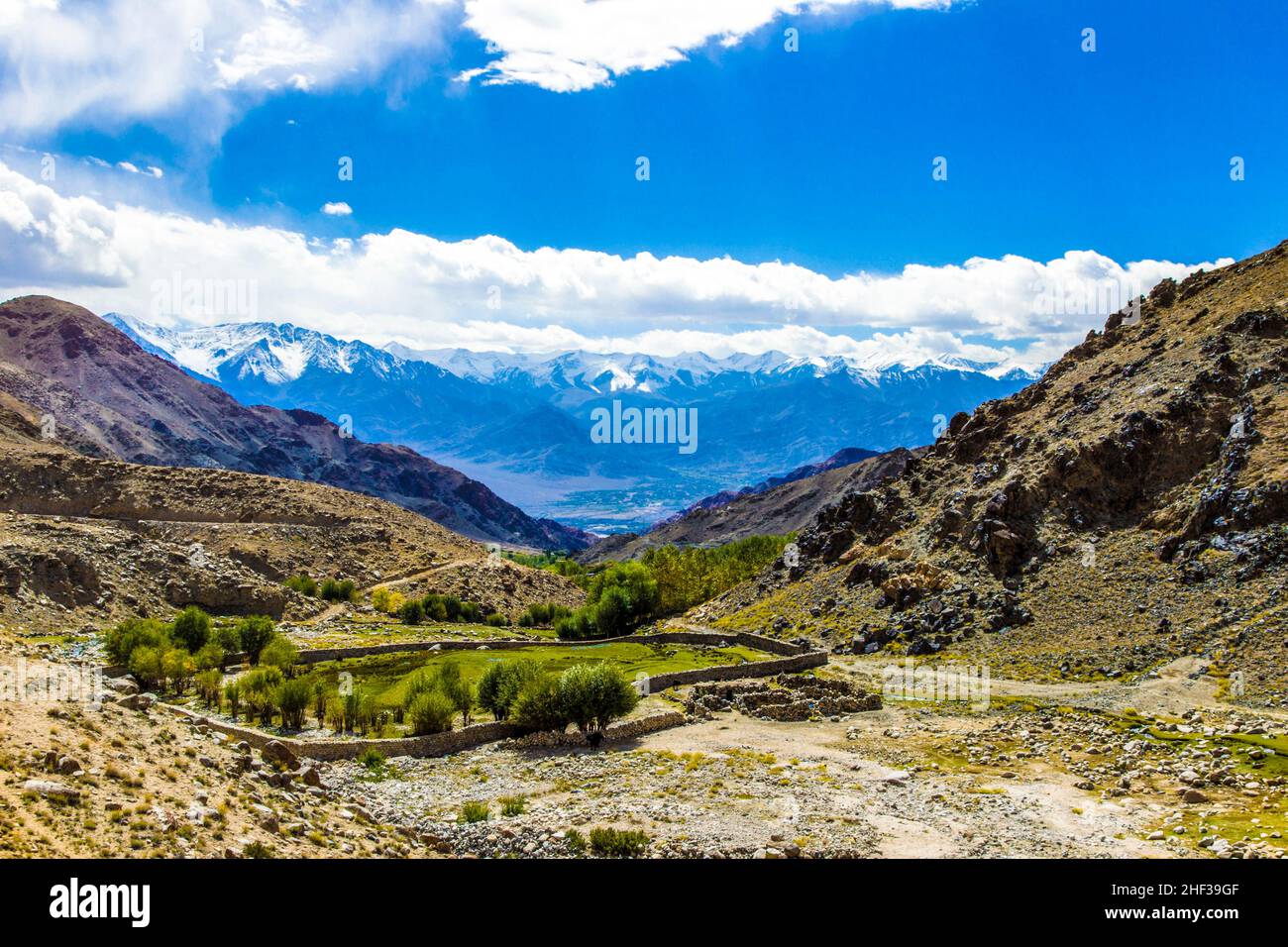 rural landscape with himalaya mountains seen from Leh valley in Ladakh ...
