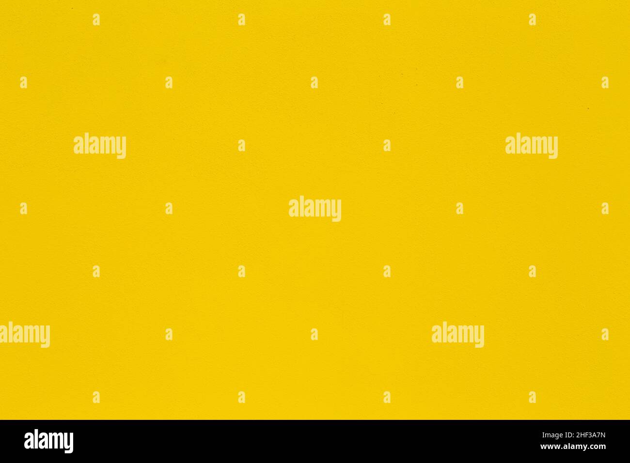 structured pattern in intensive yellow color Stock Photo - Alamy