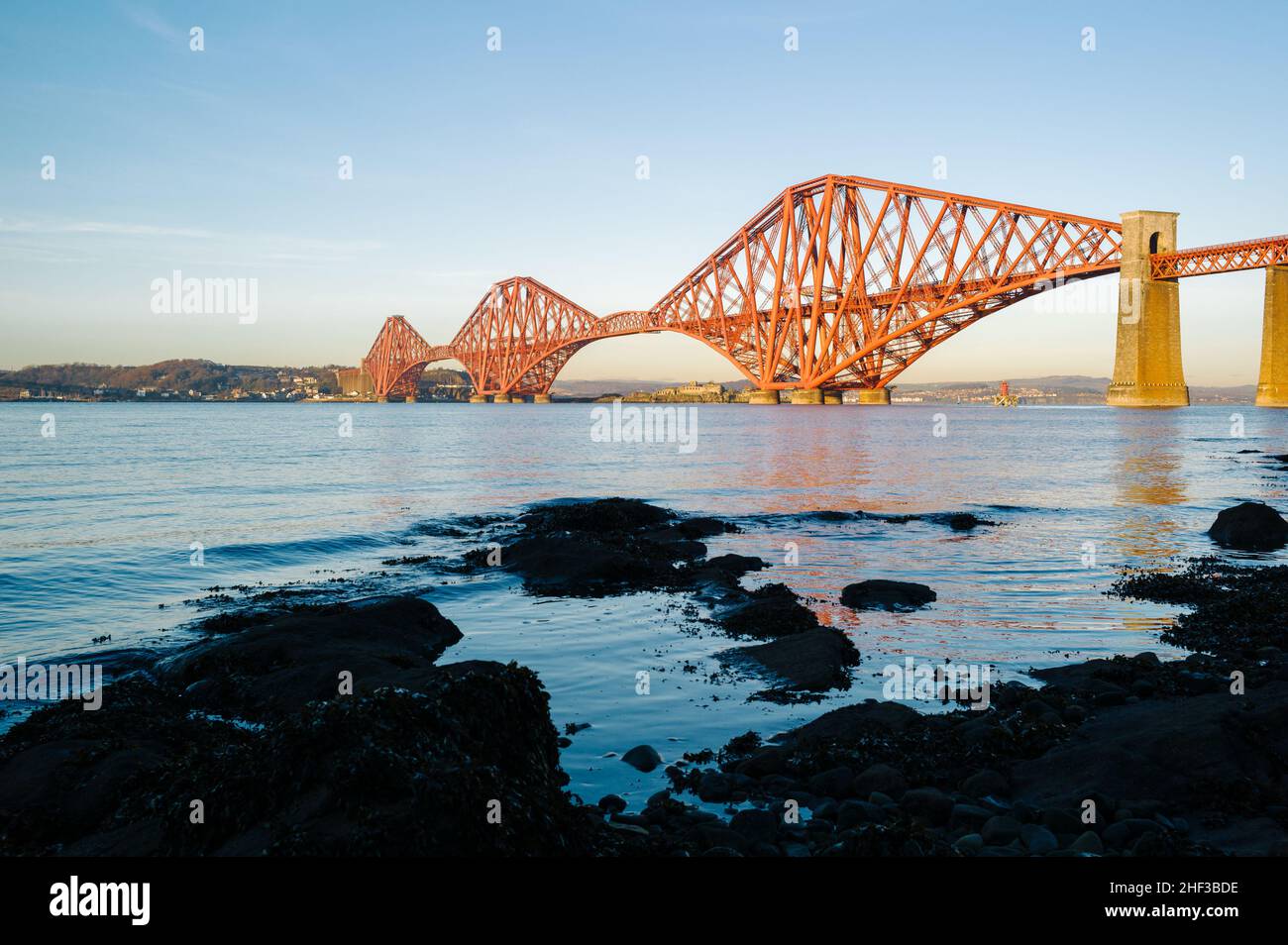 View of the iconic Forth Rail Bridge from South Queensferry. The famous ...
