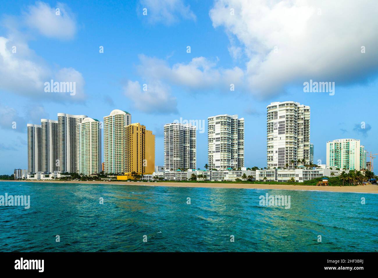beautiful Jade Beach in Miami, Sunny Isles Beach with skyscrapers Stock ...