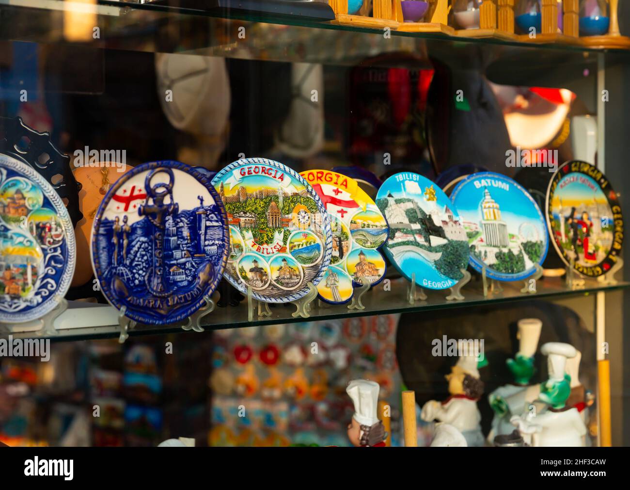 Colorful ceramic plates on showcase of Georgian gift shop Stock Photo ...